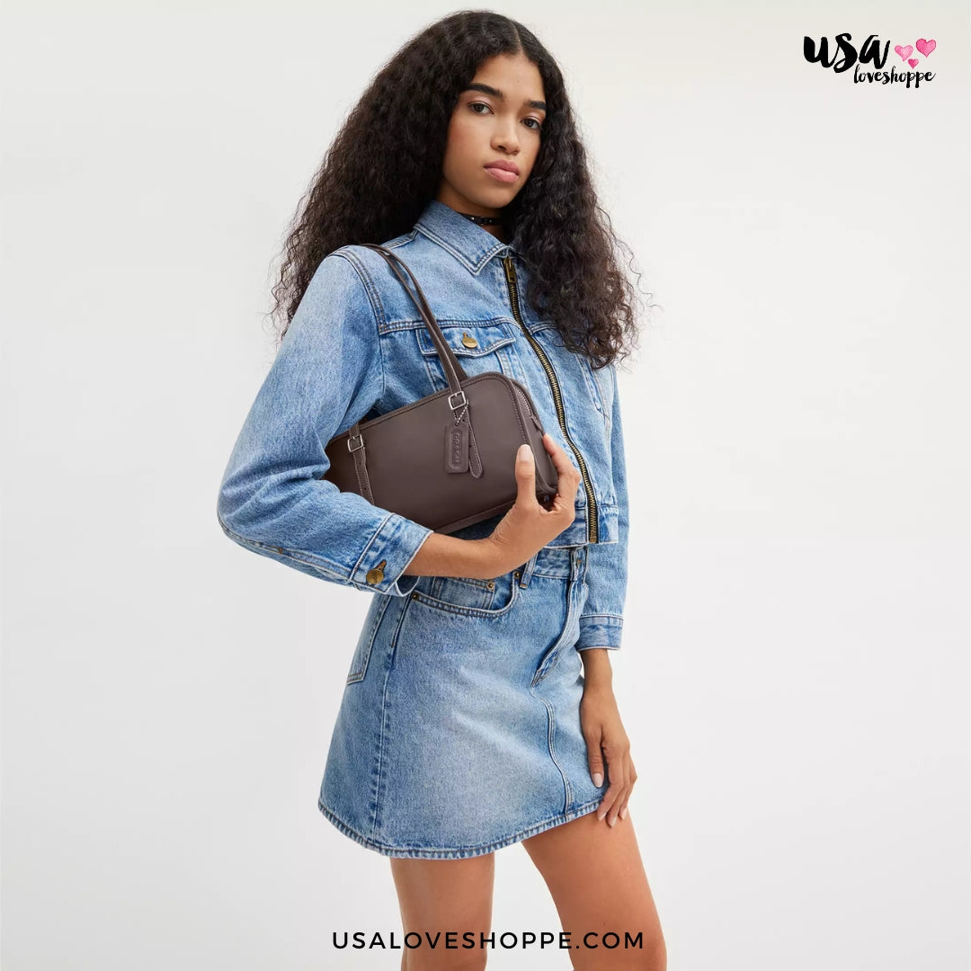 Discover the Elegance of Coach's Swing Zip Crossbody: A Must-Have for