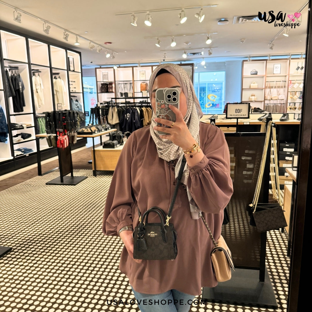 Unveiling the Chic: Coach Andrea Mini Carryall – Your Next "Must-Have"