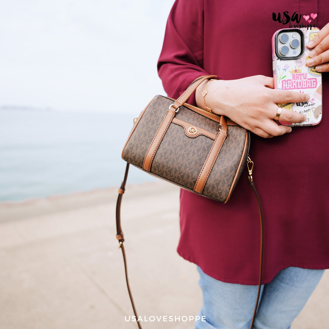 Say Hello to Your New Travel Buddy: The Michael Kors Small Duffle Cros