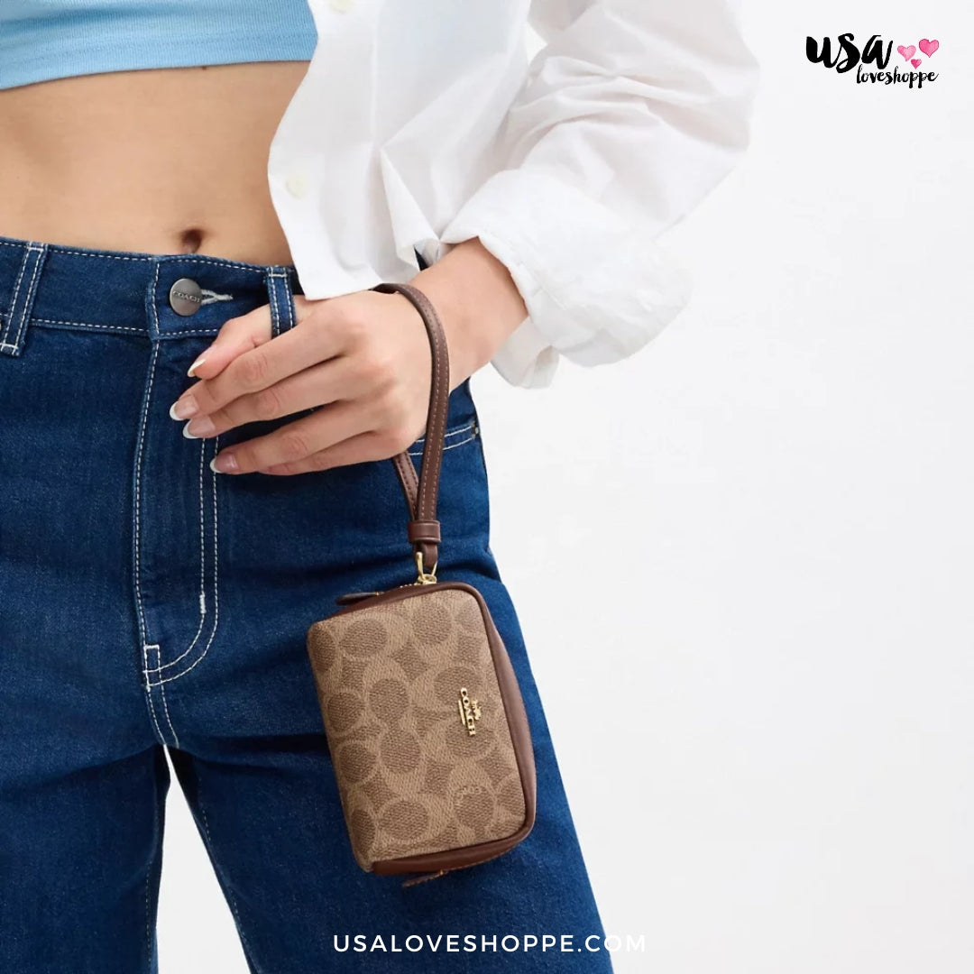 New Collection Alert: Elevate Your Style with the COACH Pouch Wristlet