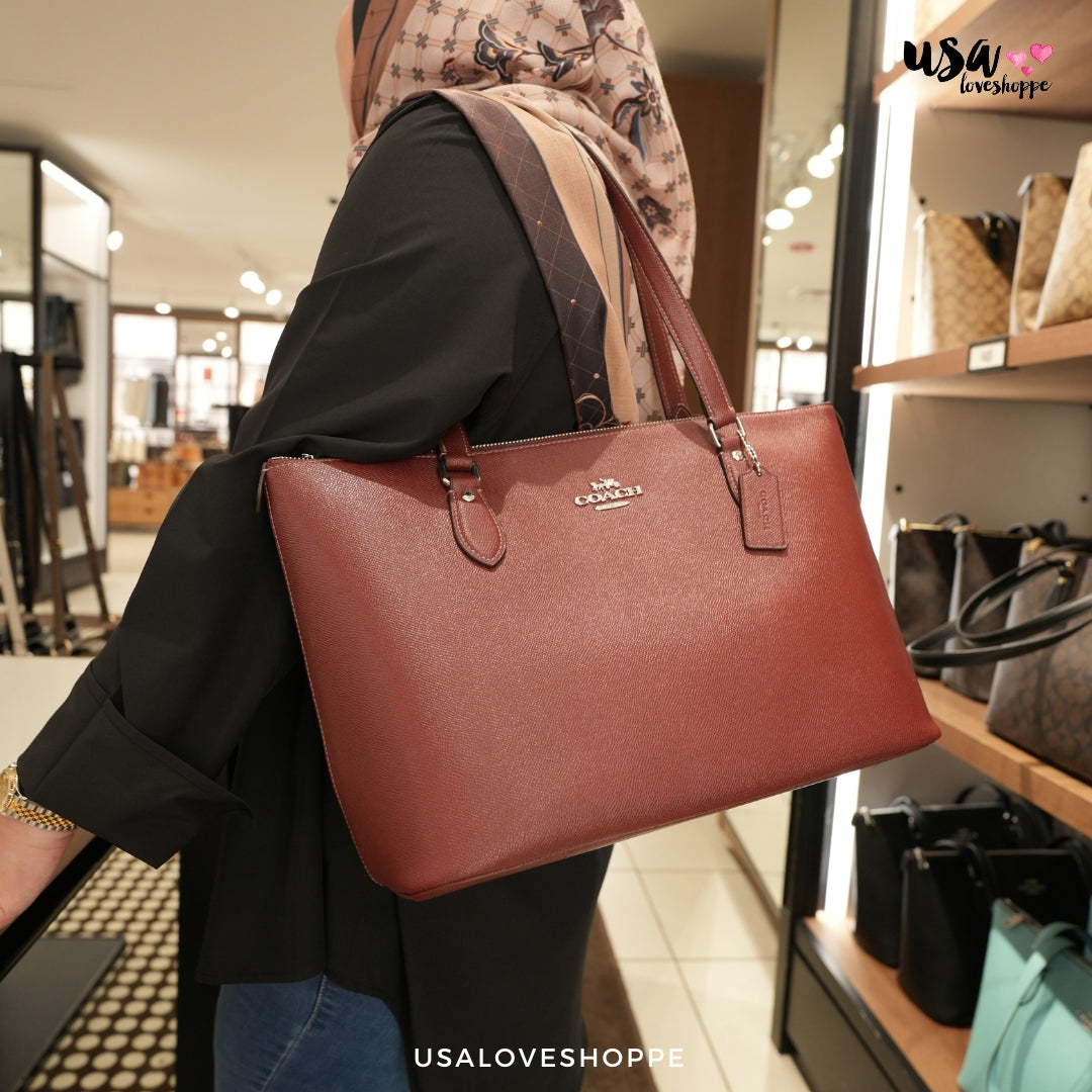 Raise Your Glass to the Gallery: Discover the Coach Wine Tote Bag at C