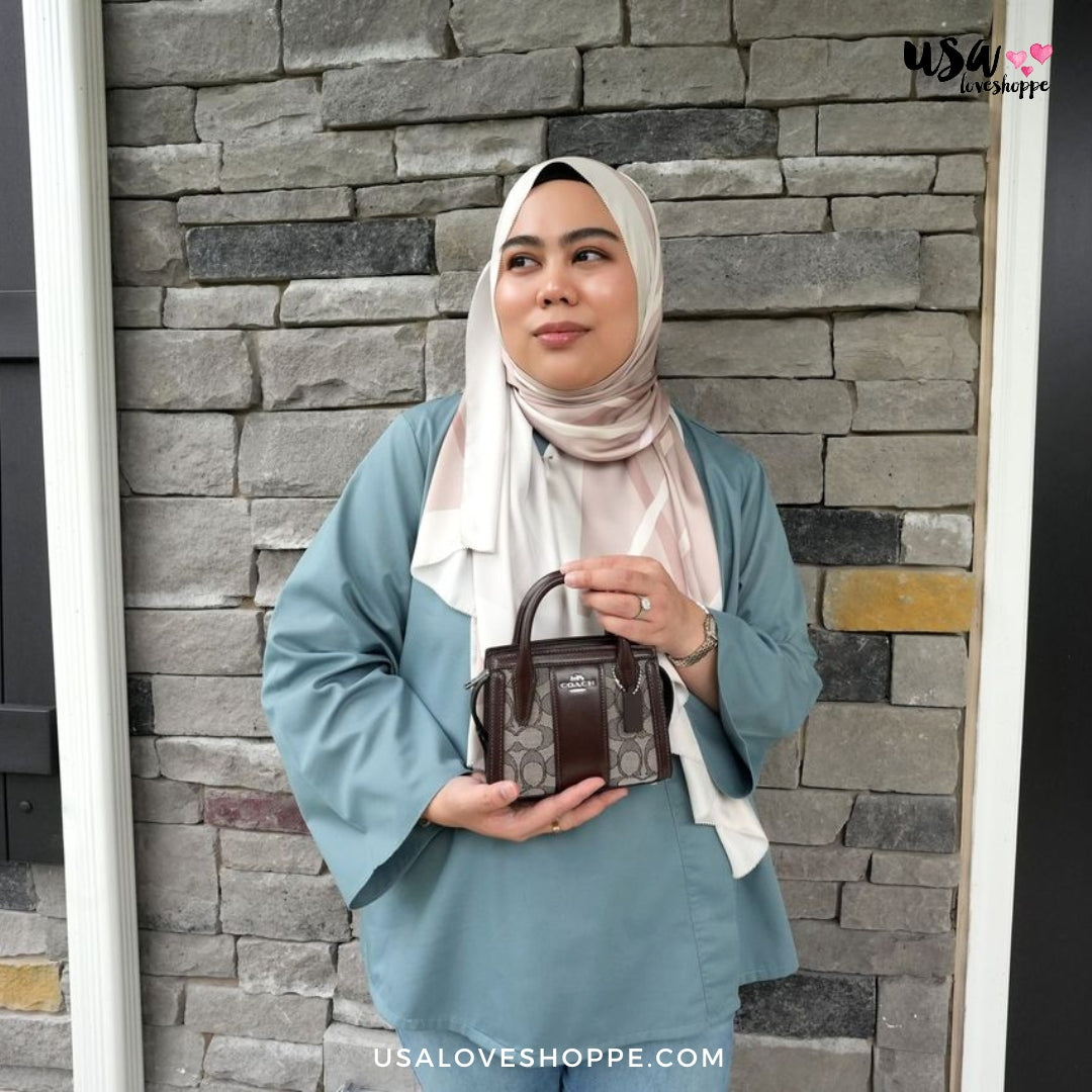 Discover Unbeatable Luxury: The Coach Andrea Mini Carryall—Your Must-H