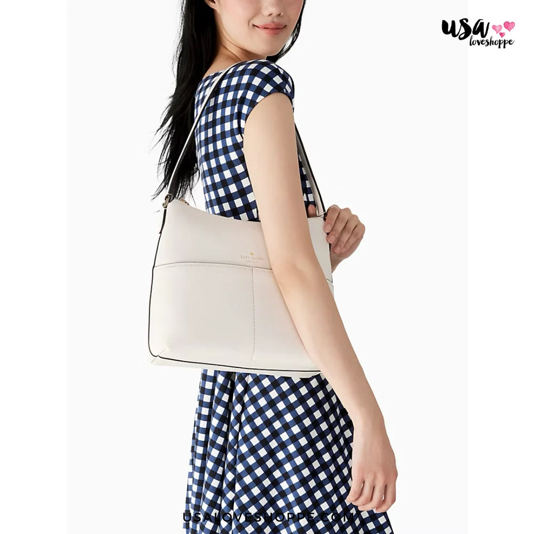 Unveiling the Elegance: The Kate Spade Bailey Shoulder Bag in Parchmen